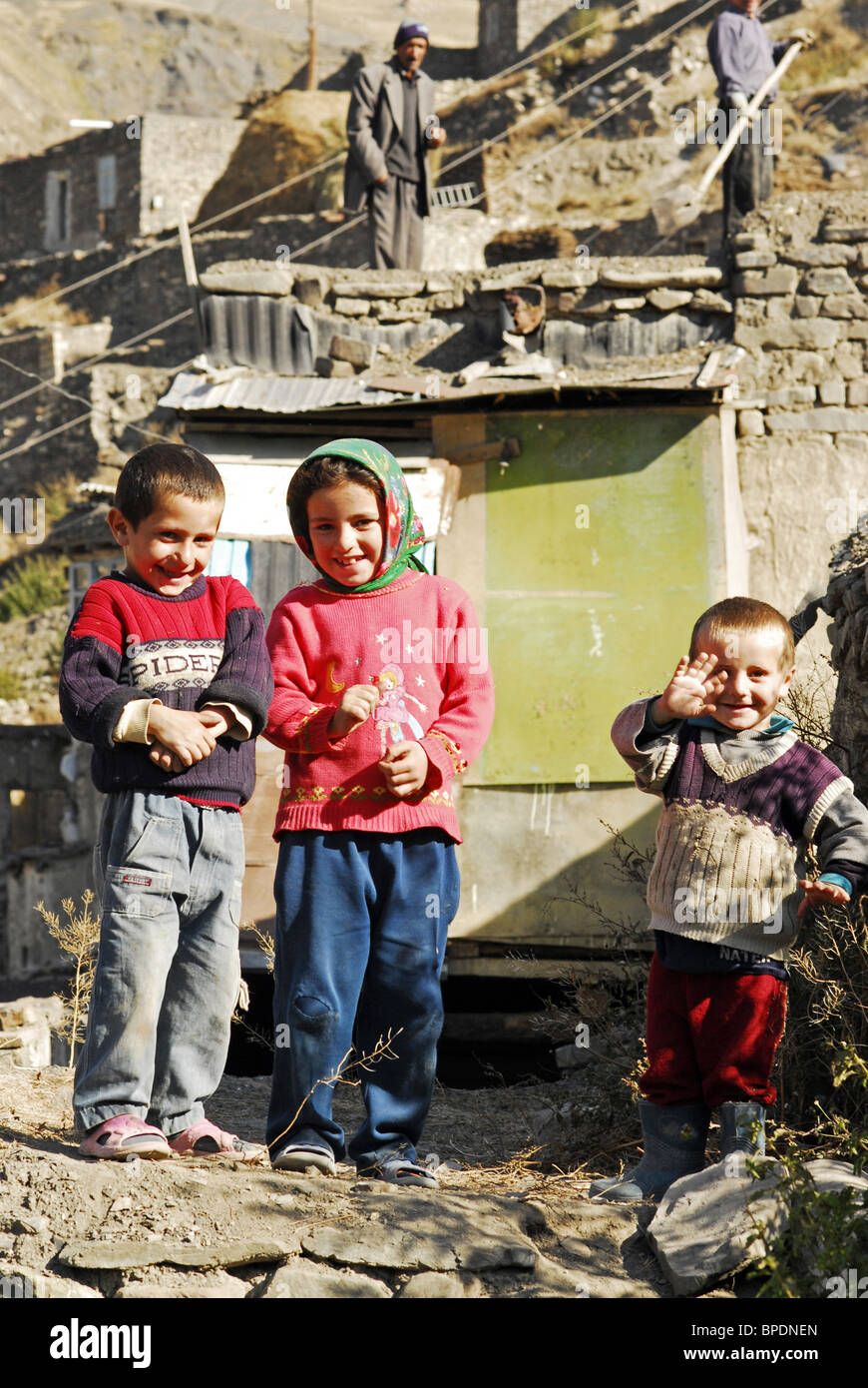 Azerbaijan, Xinaliq, portrait of young children smiling together with ...