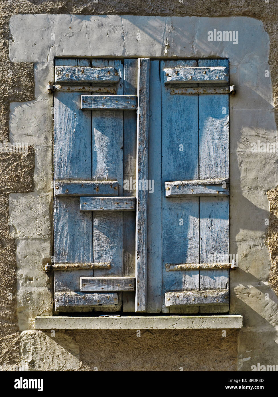 Old repaired house window shutter - sud-Touraine, France Stock Photo ...