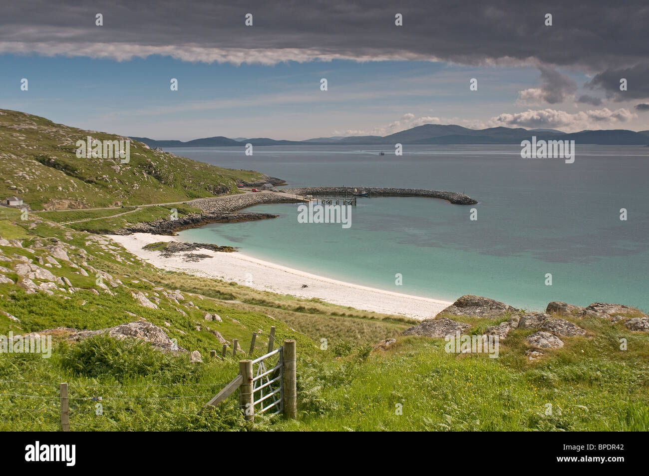 The view towards distant Barra from Eriskay in the Western Isle, Outer ...