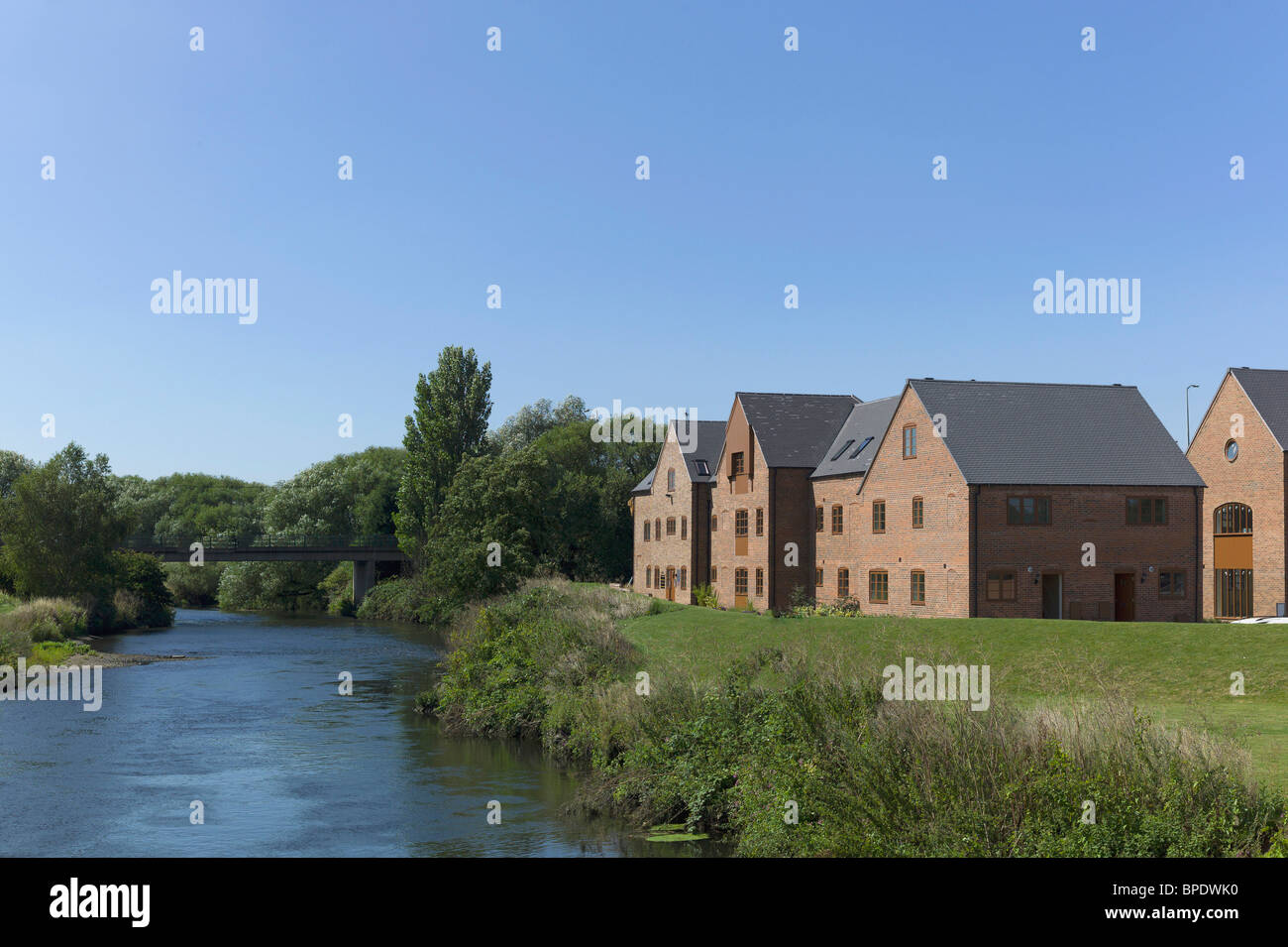 Houses next to river Stock Photo - Alamy