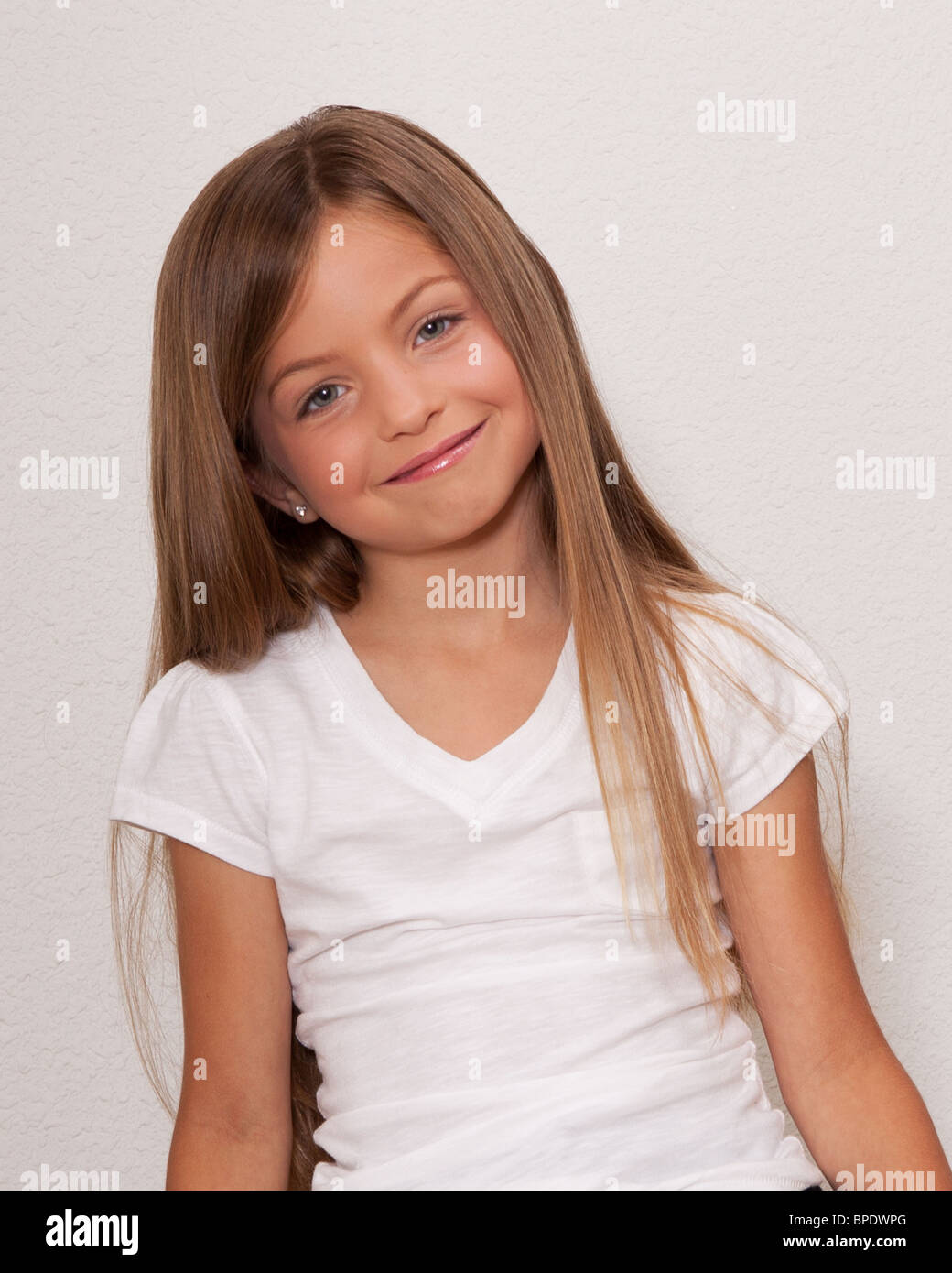 Six year-old girl chilling out Stock Photo - Alamy