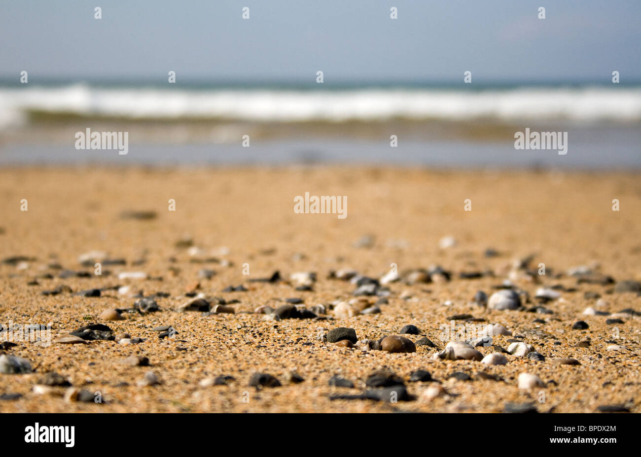 Shallow depth of field shot of pebbles on a beach at Poldhu Cove, The ...