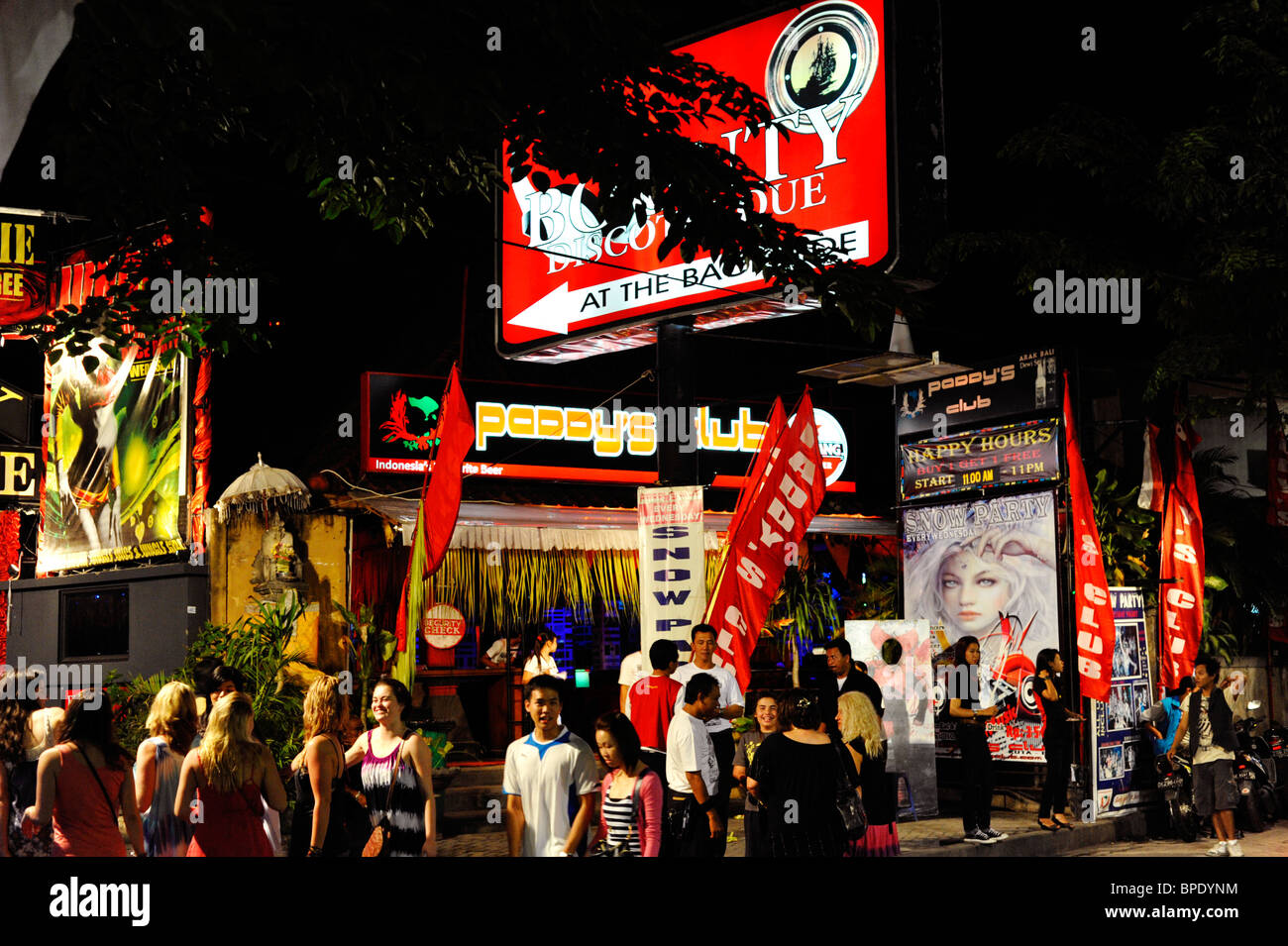 neon lit night spot new paddys in legian street kuta bali Stock Photo ...