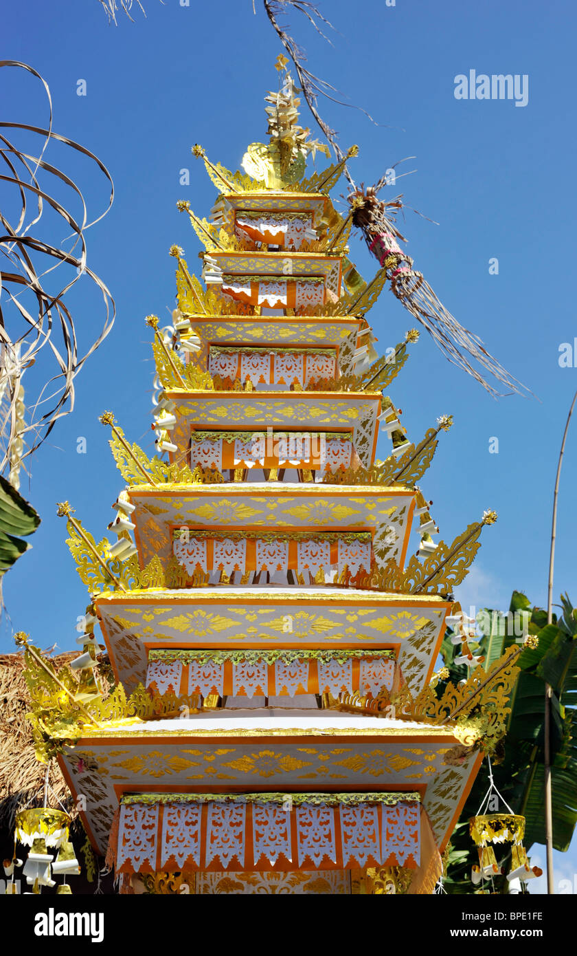 traditional temple decorations against a blue sky kuta bali Stock Photo ...