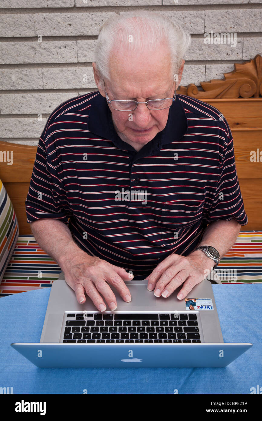 Old man with computer Stock Photo - Alamy