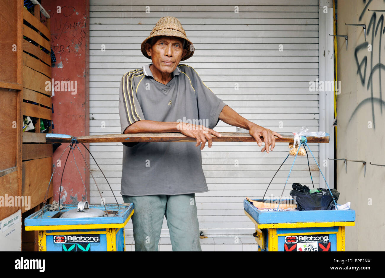 Man carrying bamboo hi-res stock photography and images - Alamy