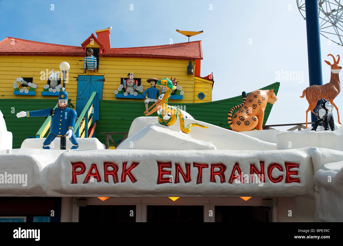 the entrance sign at the " pleasure beach " fairground in blackpool ...