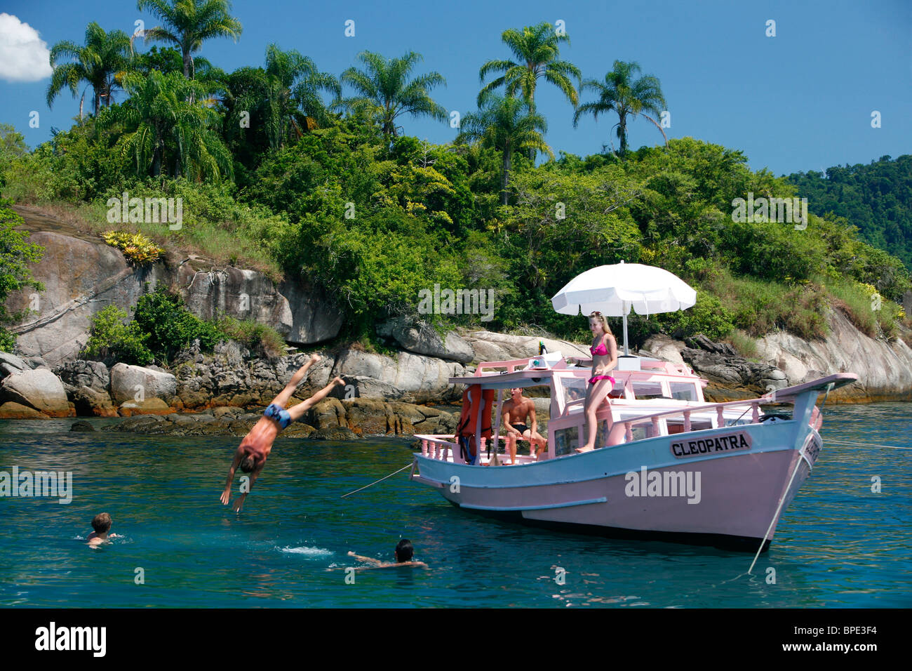 Tourist on a chartered fishing boat cruising between the different ...