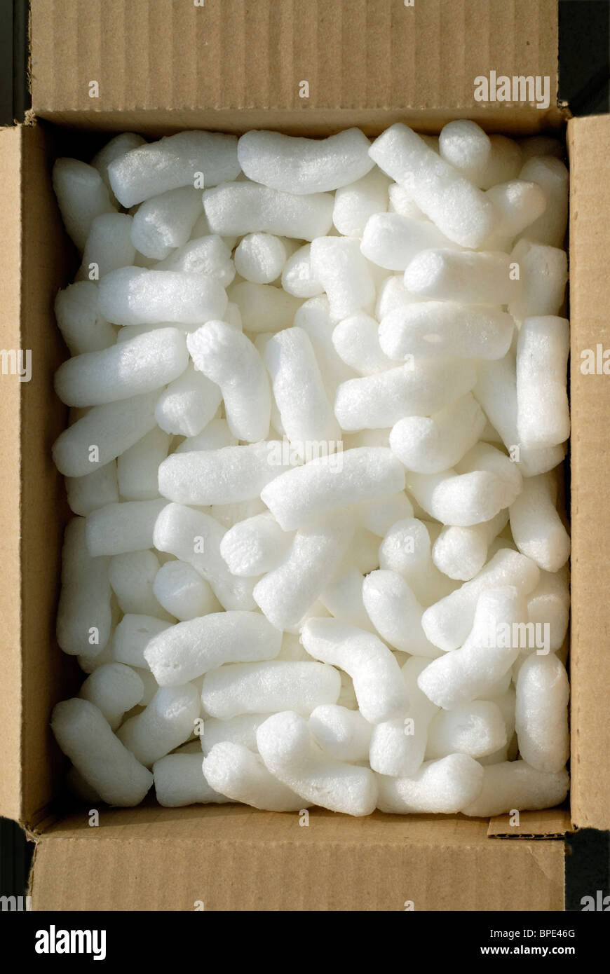Cardboard Box Full Of Protective Packaging Peanuts, For Background Use ...