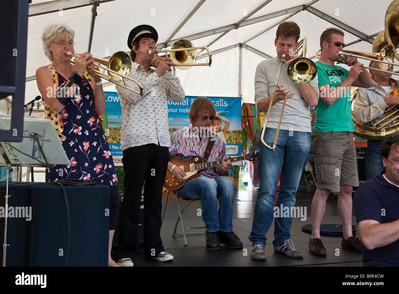 Woman playing trombone hi-res stock photography and images - Alamy