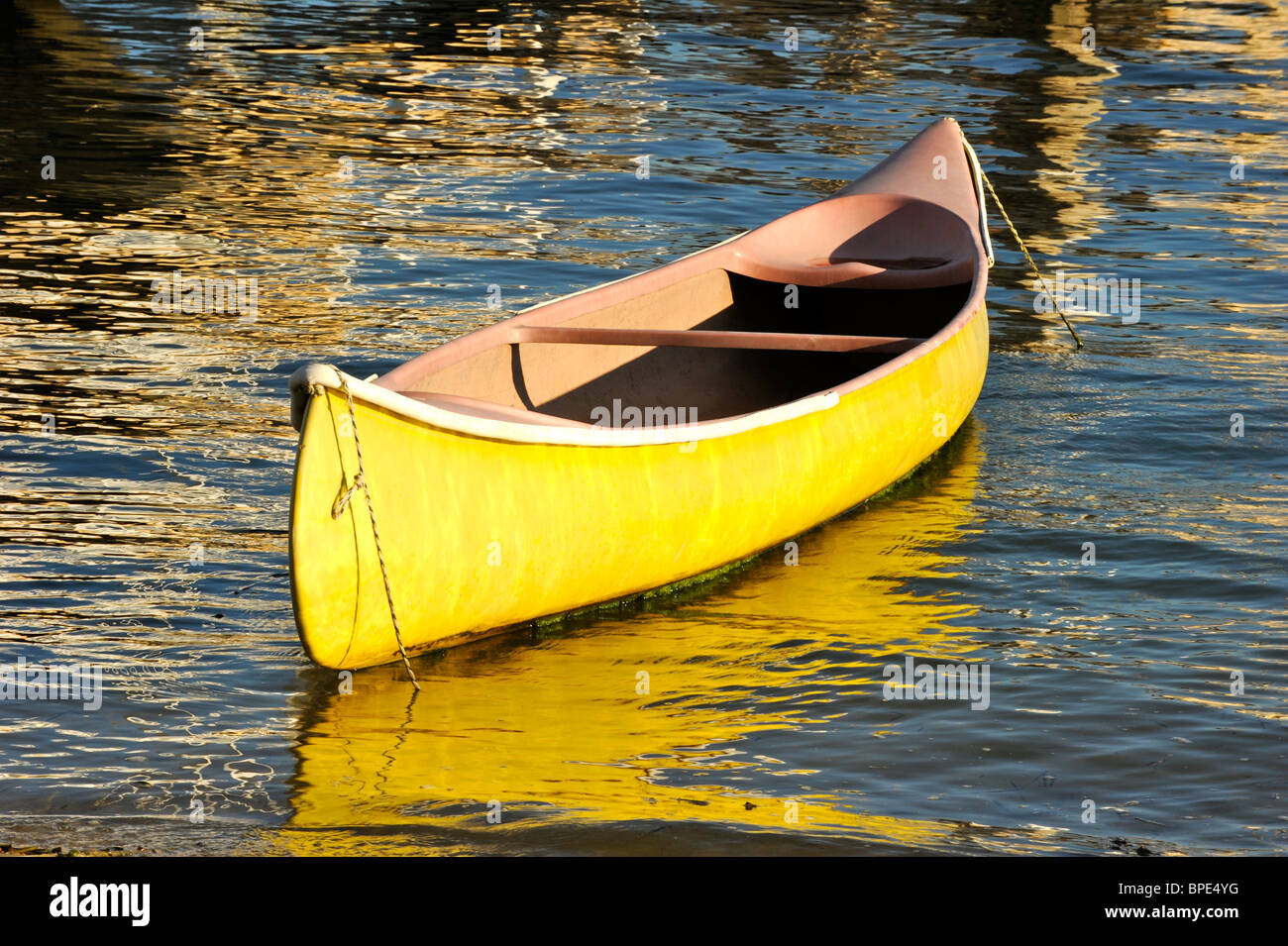 Yellow canoe hi-res stock photography and images - Alamy