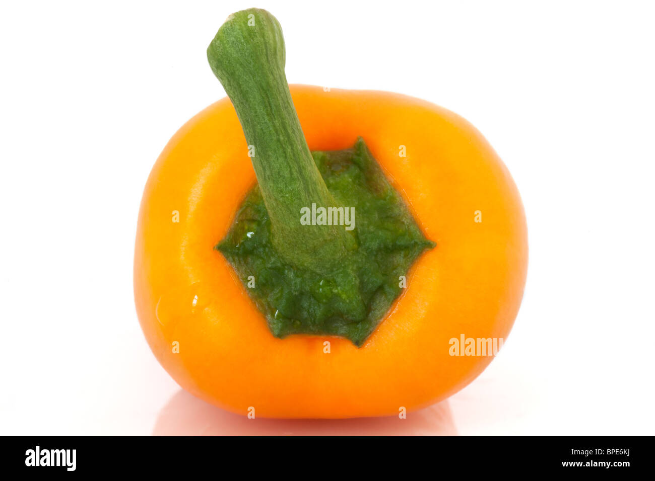Closeup of top of orange pepper Stock Photo - Alamy