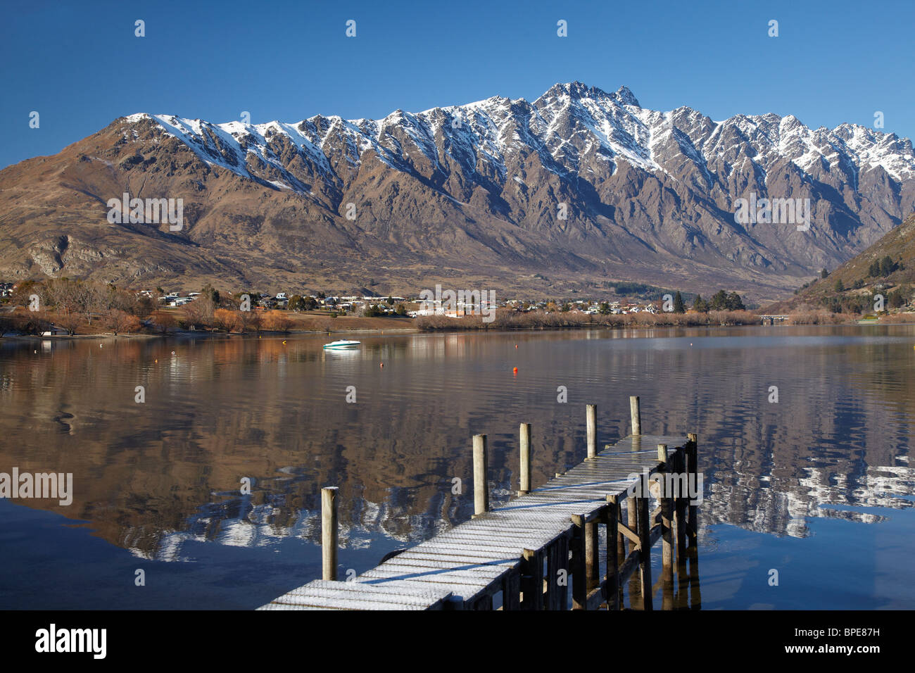 Jetty, and The Remarkables, Reflected in Lake Wakatipu, Queenstown ...