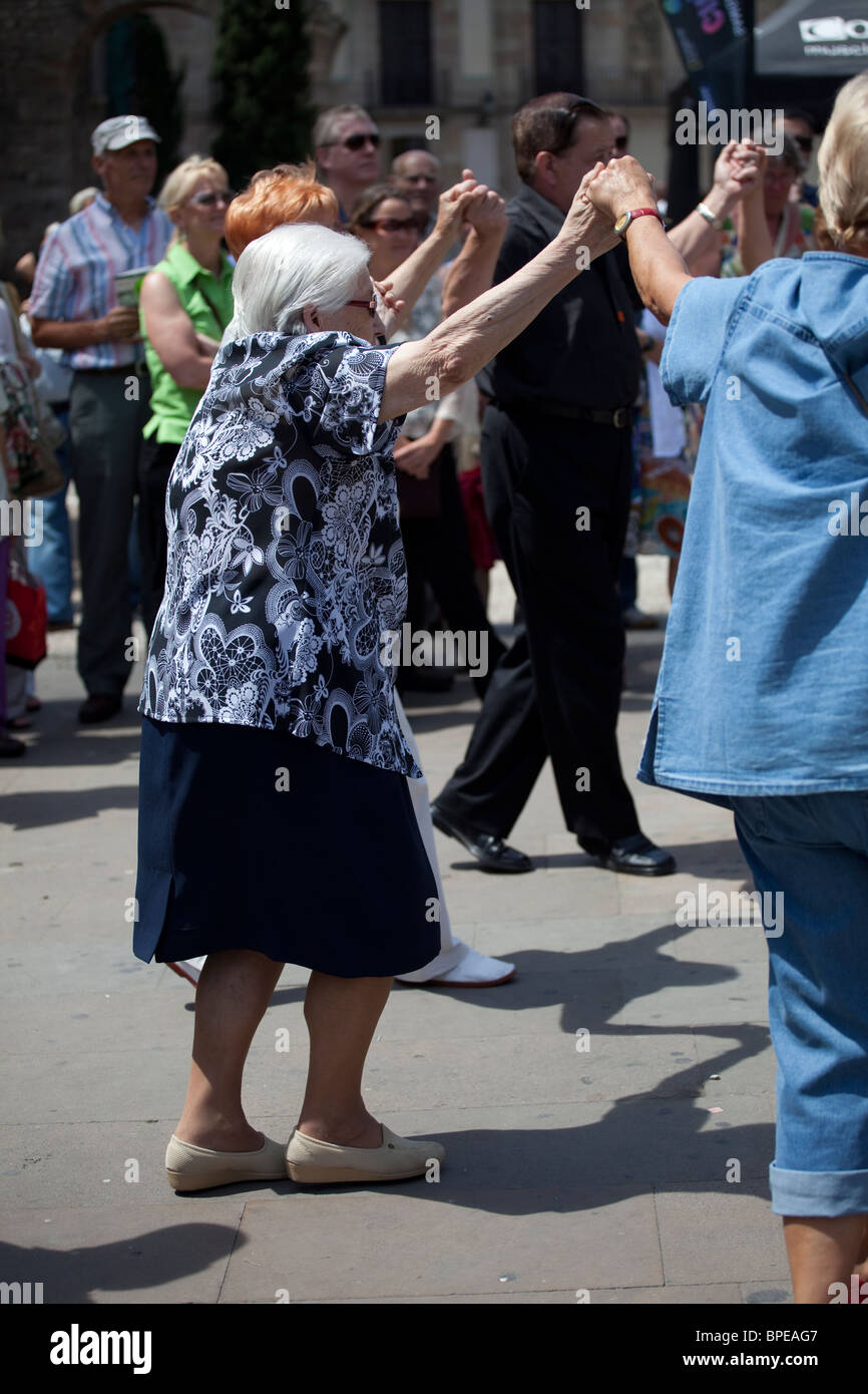 People dancing sardana traditional dance hi-res stock photography and ...