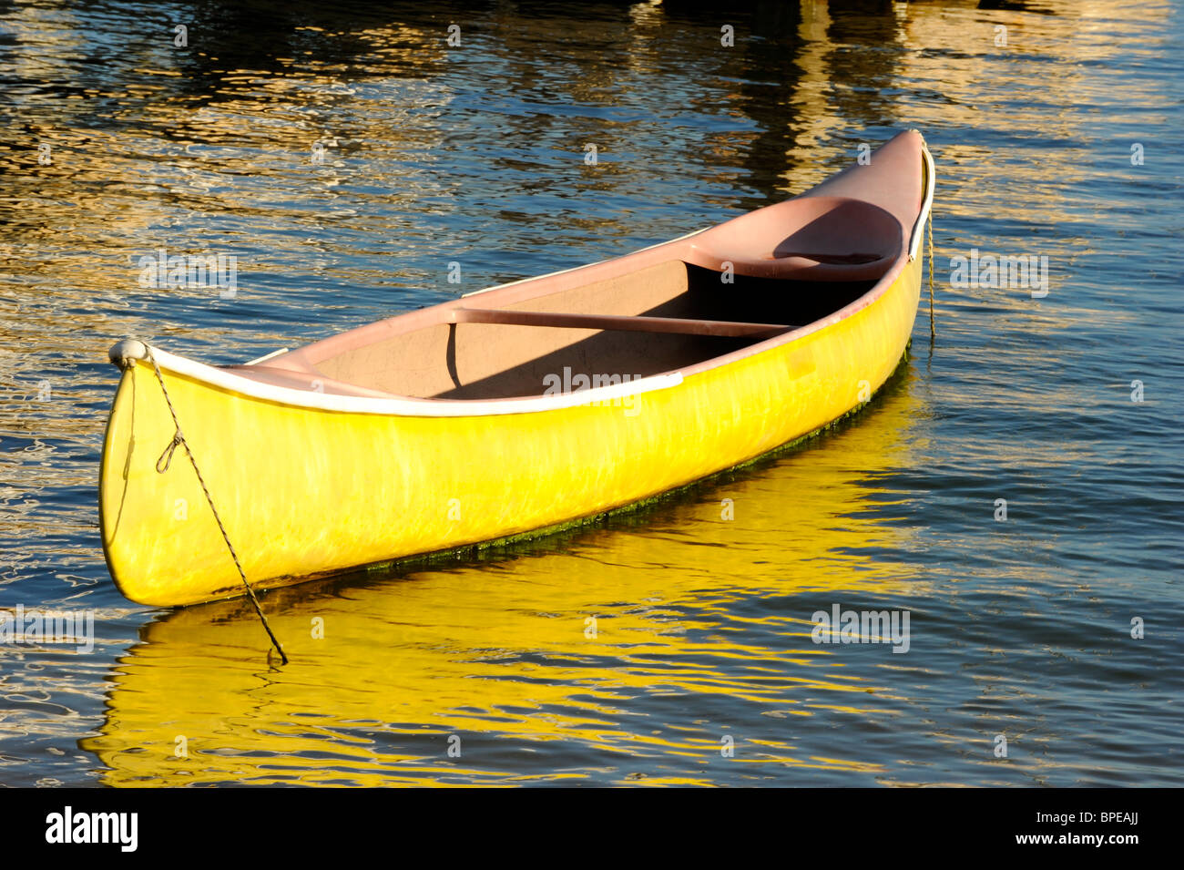 Yellow canoe hi-res stock photography and images - Alamy