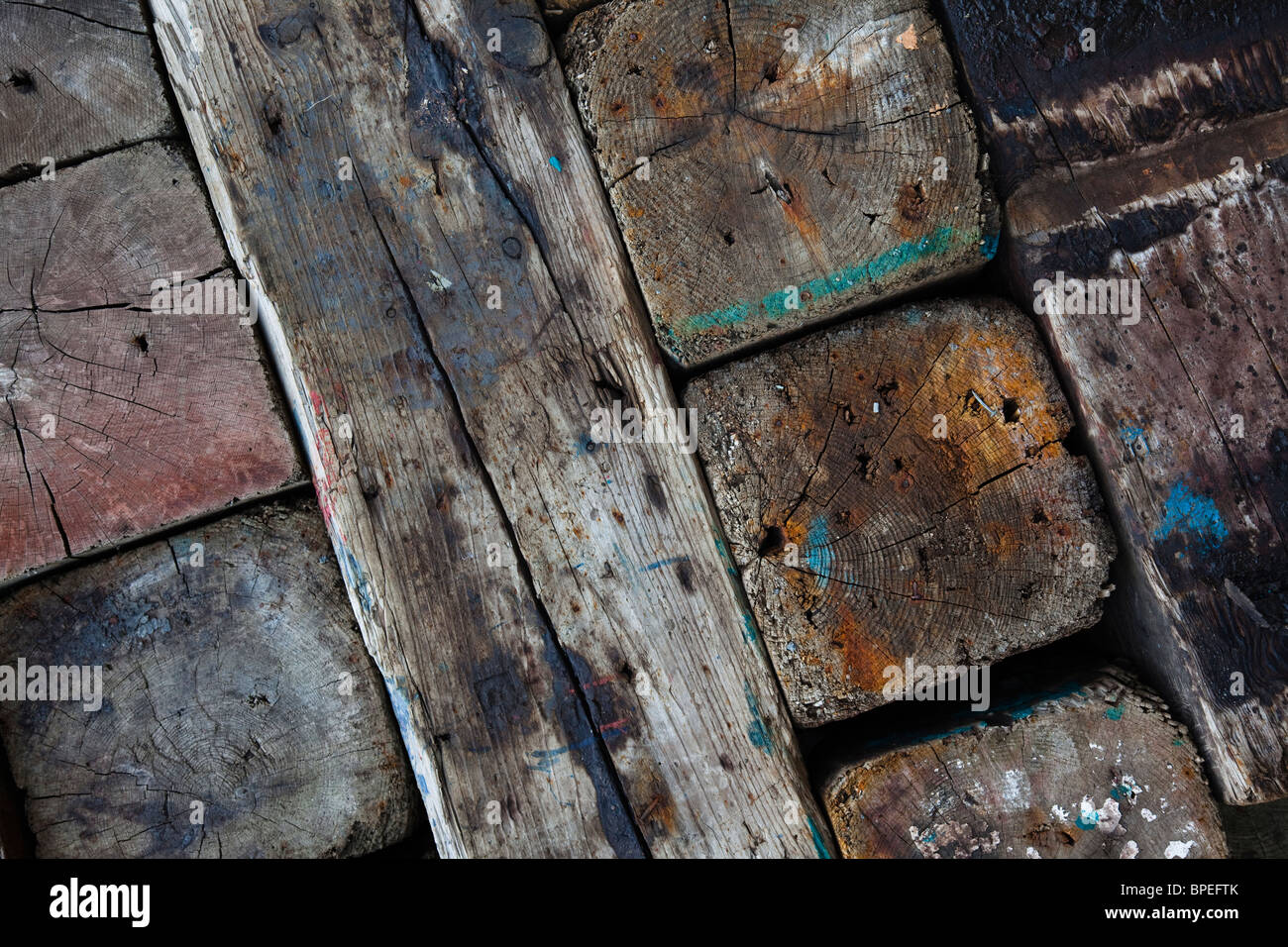 old rough wood stacked and piled high, wood storage facility, Troon ...