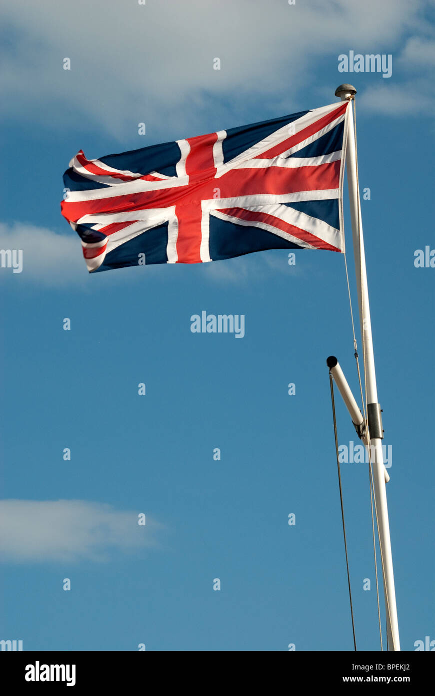Union Jack flying on a flagpole Stock Photo - Alamy