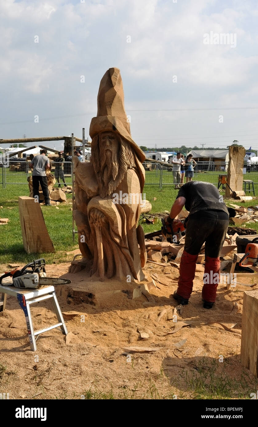 Competitor using a chainsaw in the Woodfest Wood Carving competition St ...