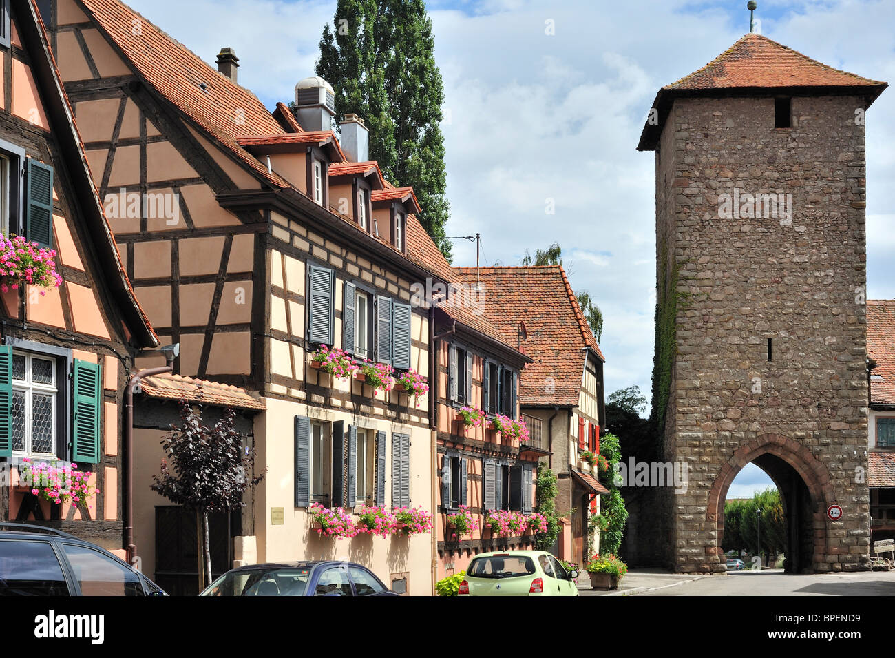 Town gate and colorful façades of timber framed houses at Dambach-la ...
