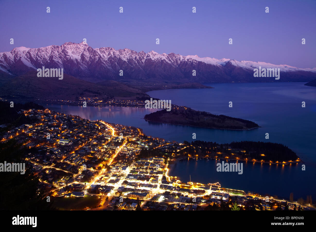 Dusk over Queenstown and Lake Wakatipu, South Island, New Zealand Stock ...