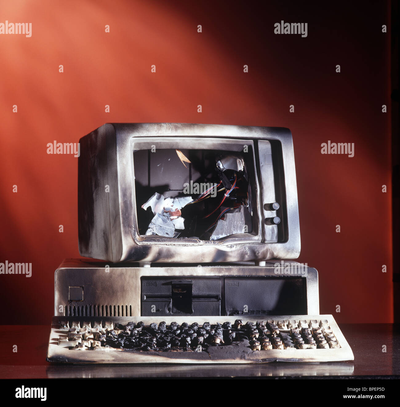 Computer PC keyboard all burnt black monitor smashed Stock Photo - Alamy