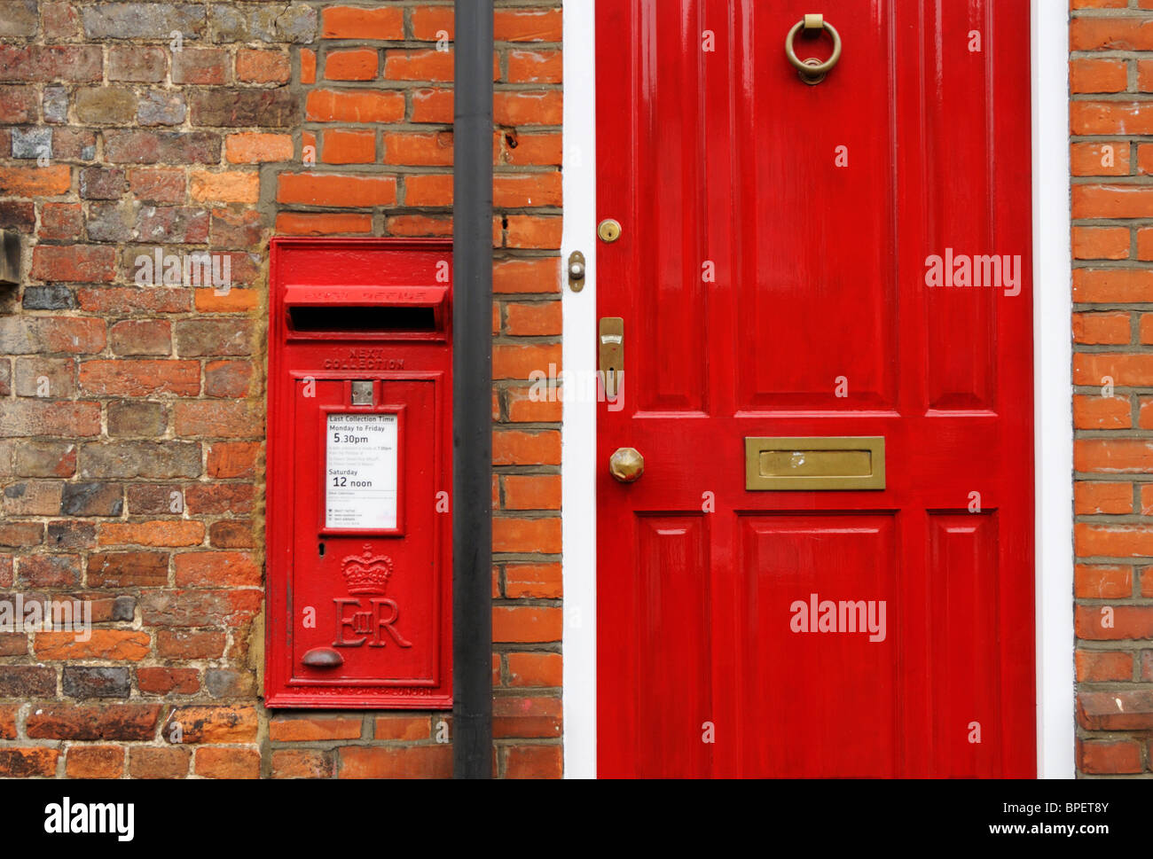 A red letter box in the wall of 76 Fishpool Street, St Albans, UK Stock ...