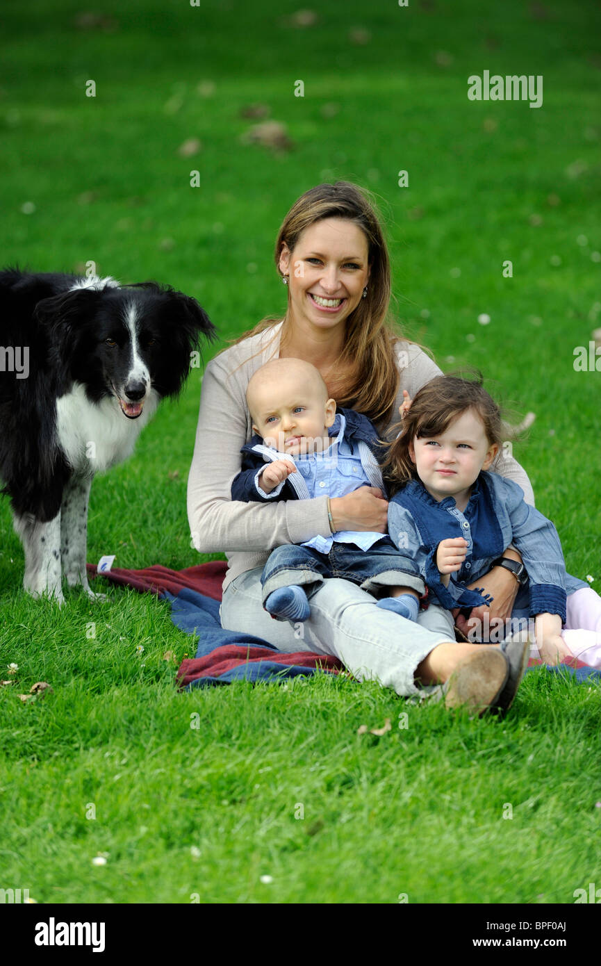 Happy, upper middle class family with two children, a boy and girl ...