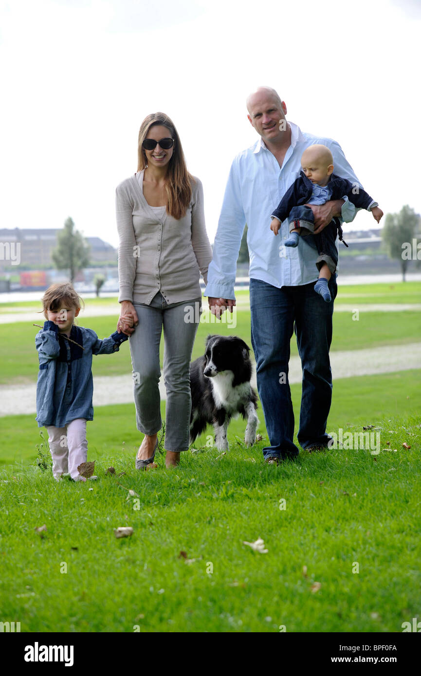 Happy, upper middle class family with two children, a boy and girl ...