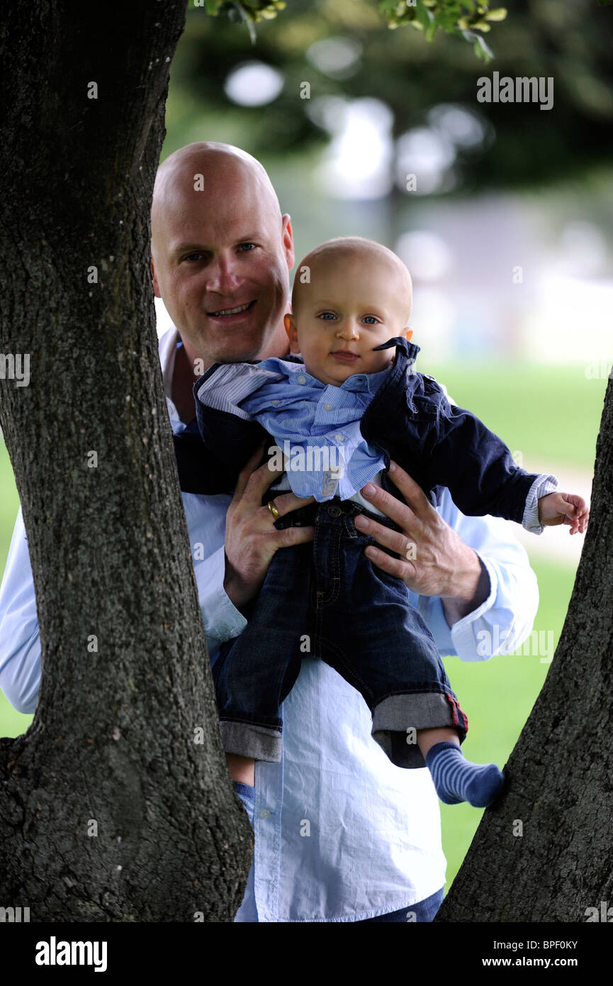 Happy, upper middle class family with two children, a boy and girl ...