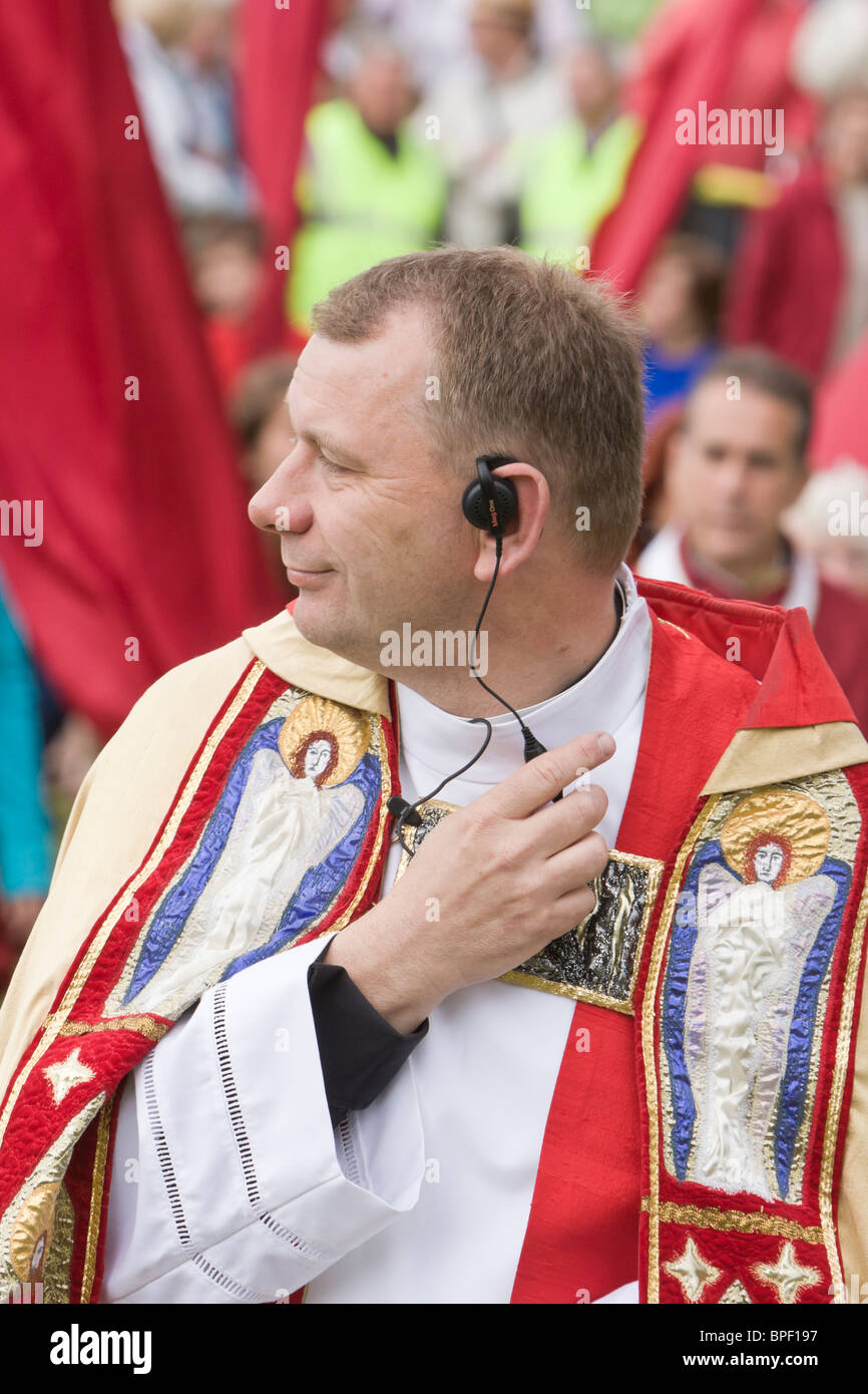 Anglican Archdeacon wearing a earpiece and radio, Albantide parade, St ...