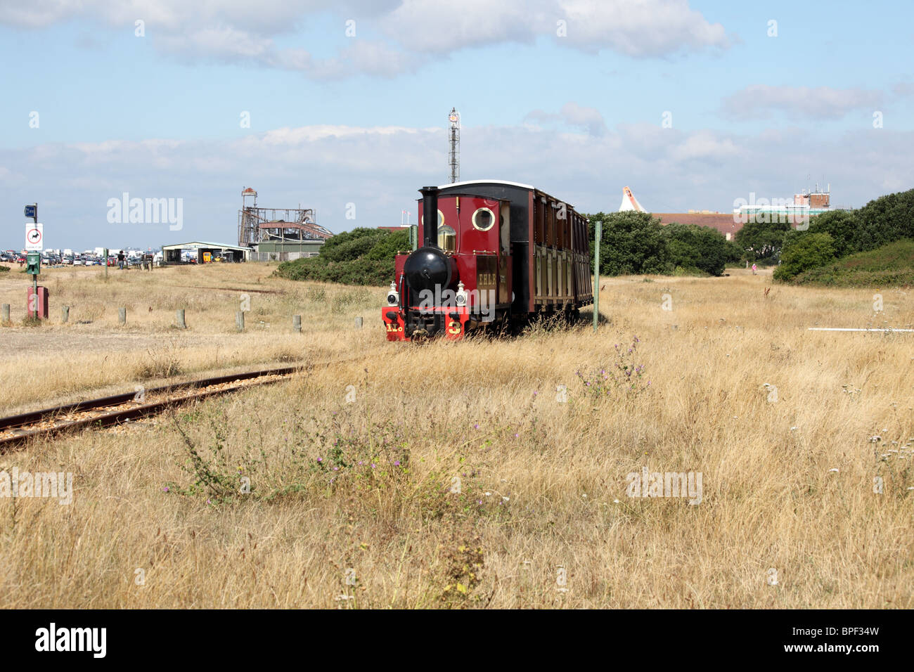 Seafront steam train with Beachlands funfair in the background, Hayling ...