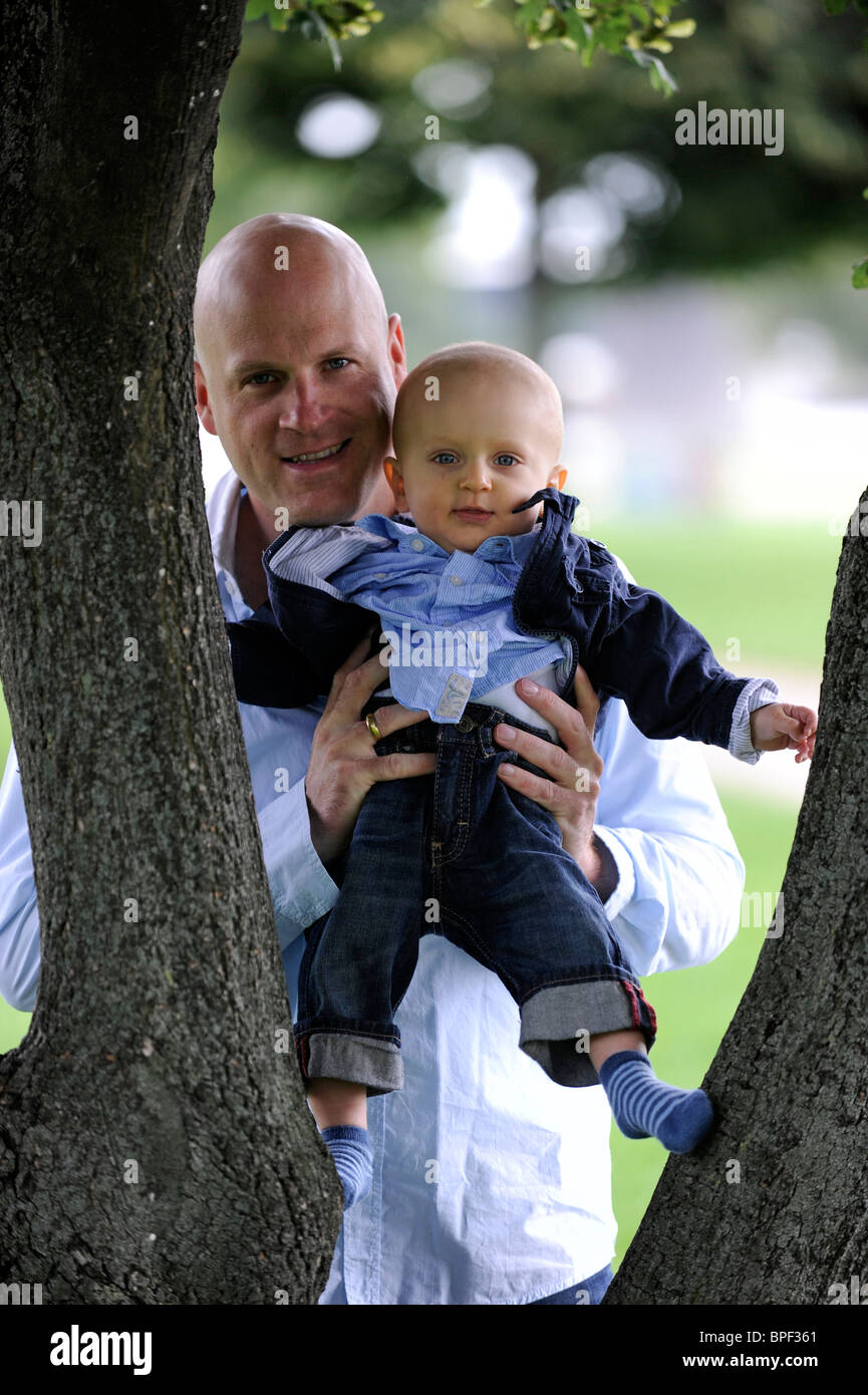 Happy, upper middle class family with two children, a boy and girl ...