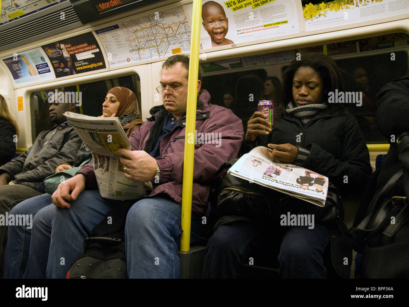 Newspaper on the tube hi-res stock photography and images - Alamy