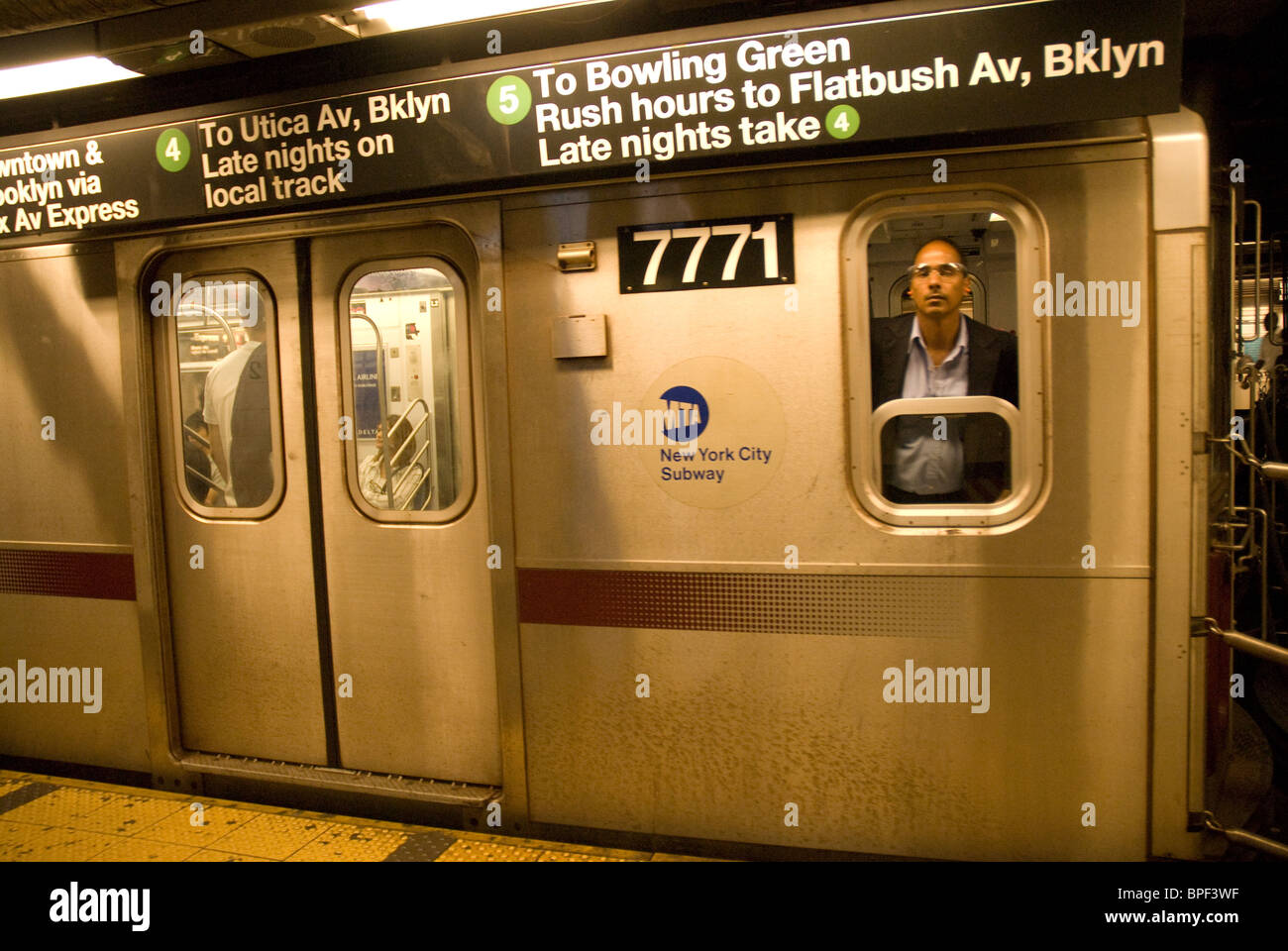 People riding on the New York subway Stock Photo - Alamy