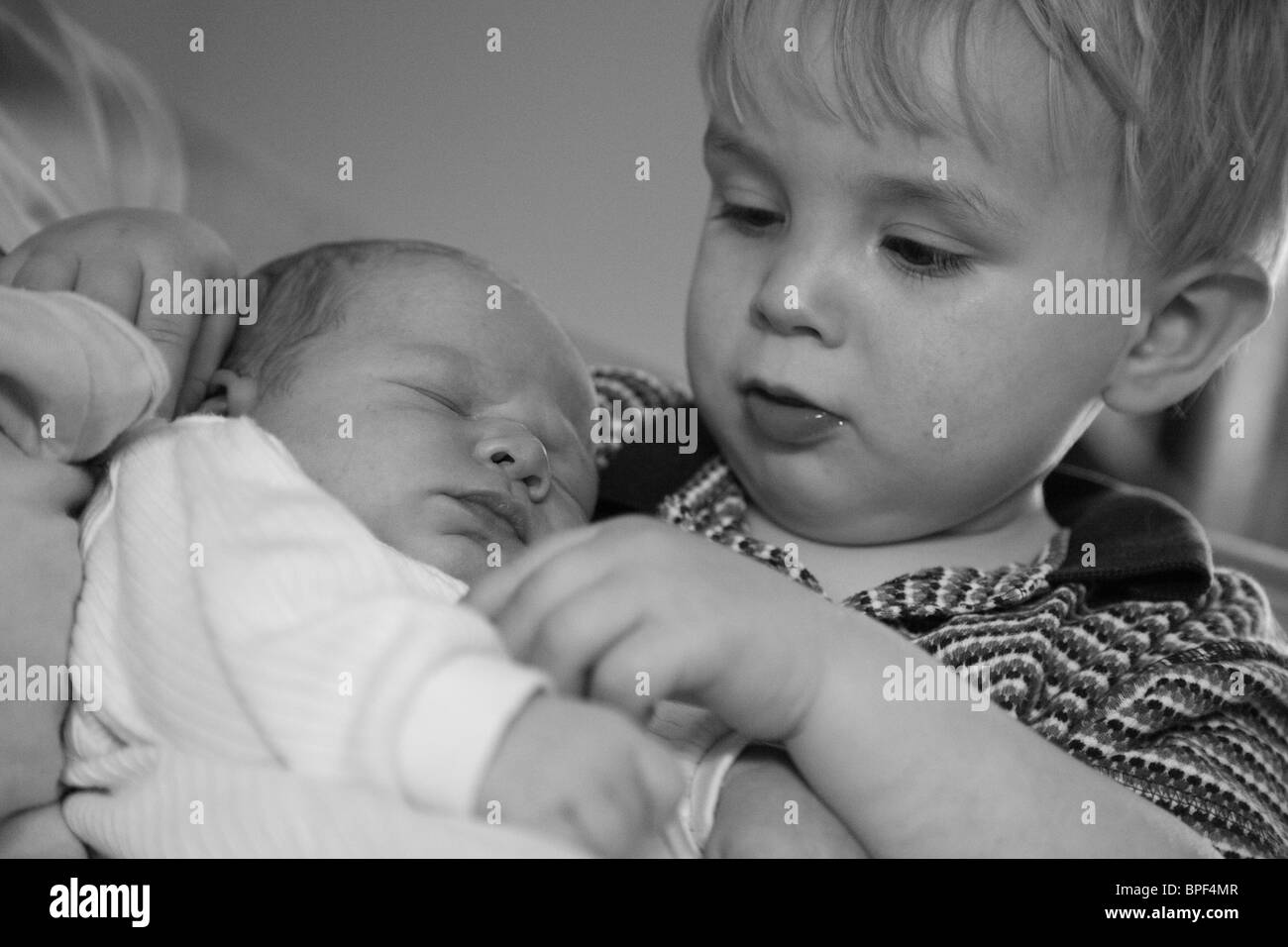 toddler with baby Stock Photo - Alamy
