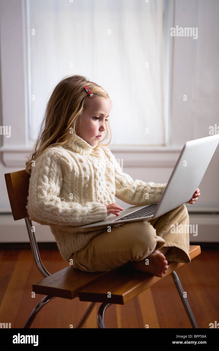 Young Girl Working On The Computer Stock Photo - Alamy