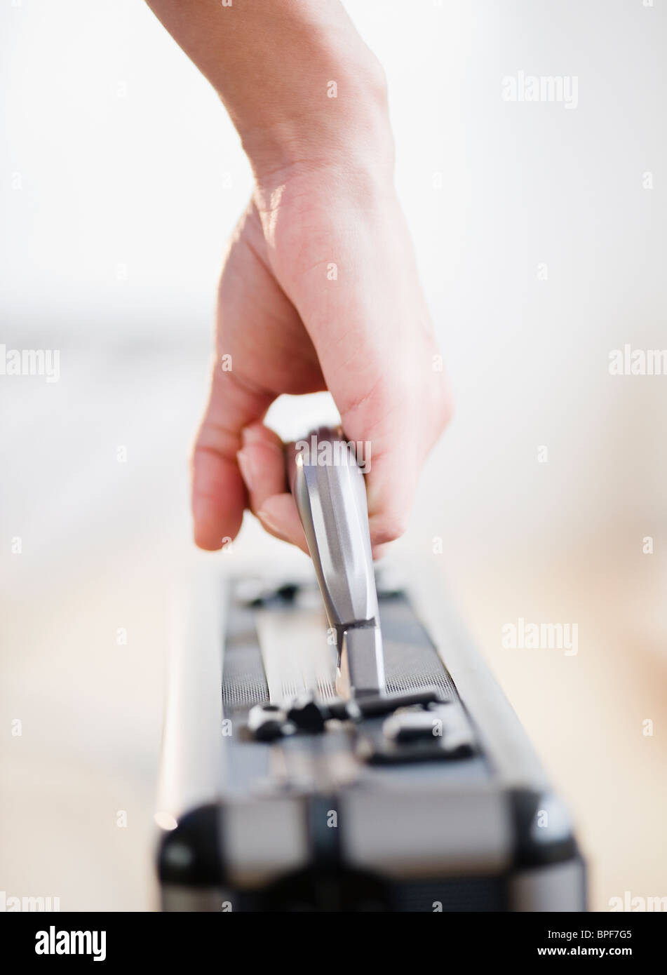 Hand holding briefcase hi-res stock photography and images - Alamy