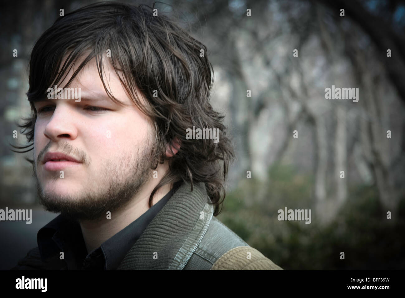 A young man, contemplating, thinking, thoughtful Stock Photo - Alamy