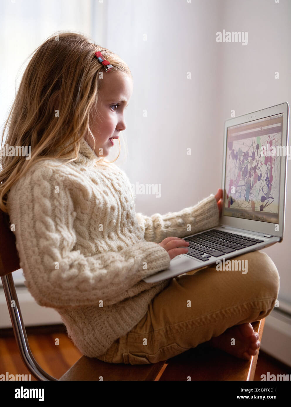 Young Girl Working On The Computer Stock Photo - Alamy