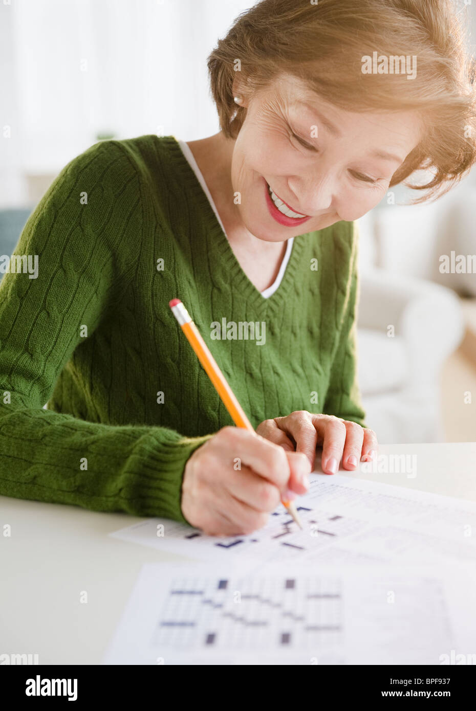 Solving puzzle hi-res stock photography and images - Alamy