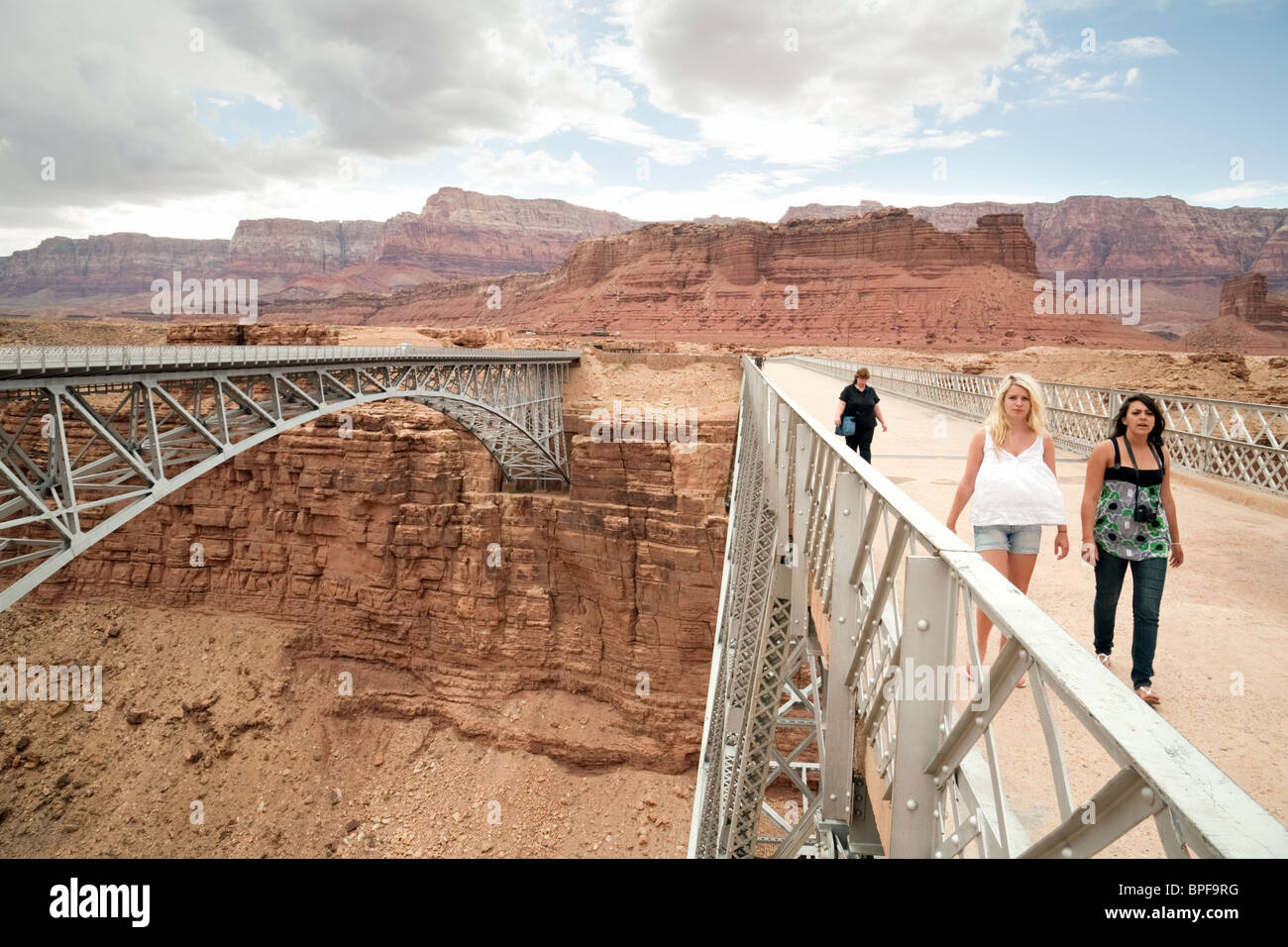 Tourists people crossing bridge hi-res stock photography and images - Alamy