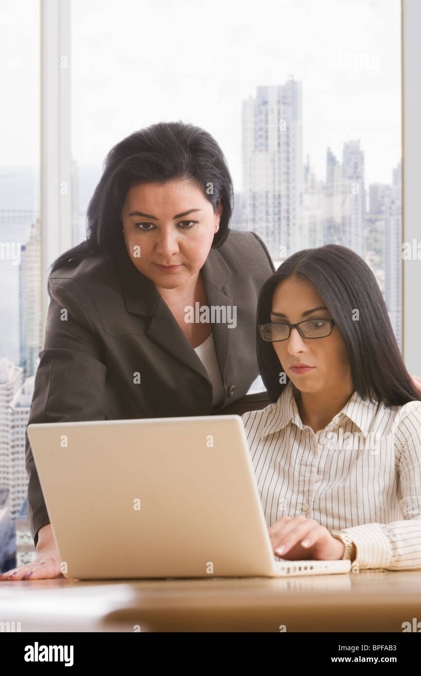 Businesswomen using laptop Stock Photo - Alamy Businesswomen using laptop Stock Photo - Alamy