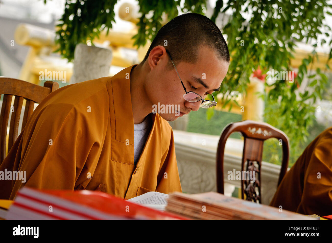 Monk studying in Xian, China Stock Photo - Alamy