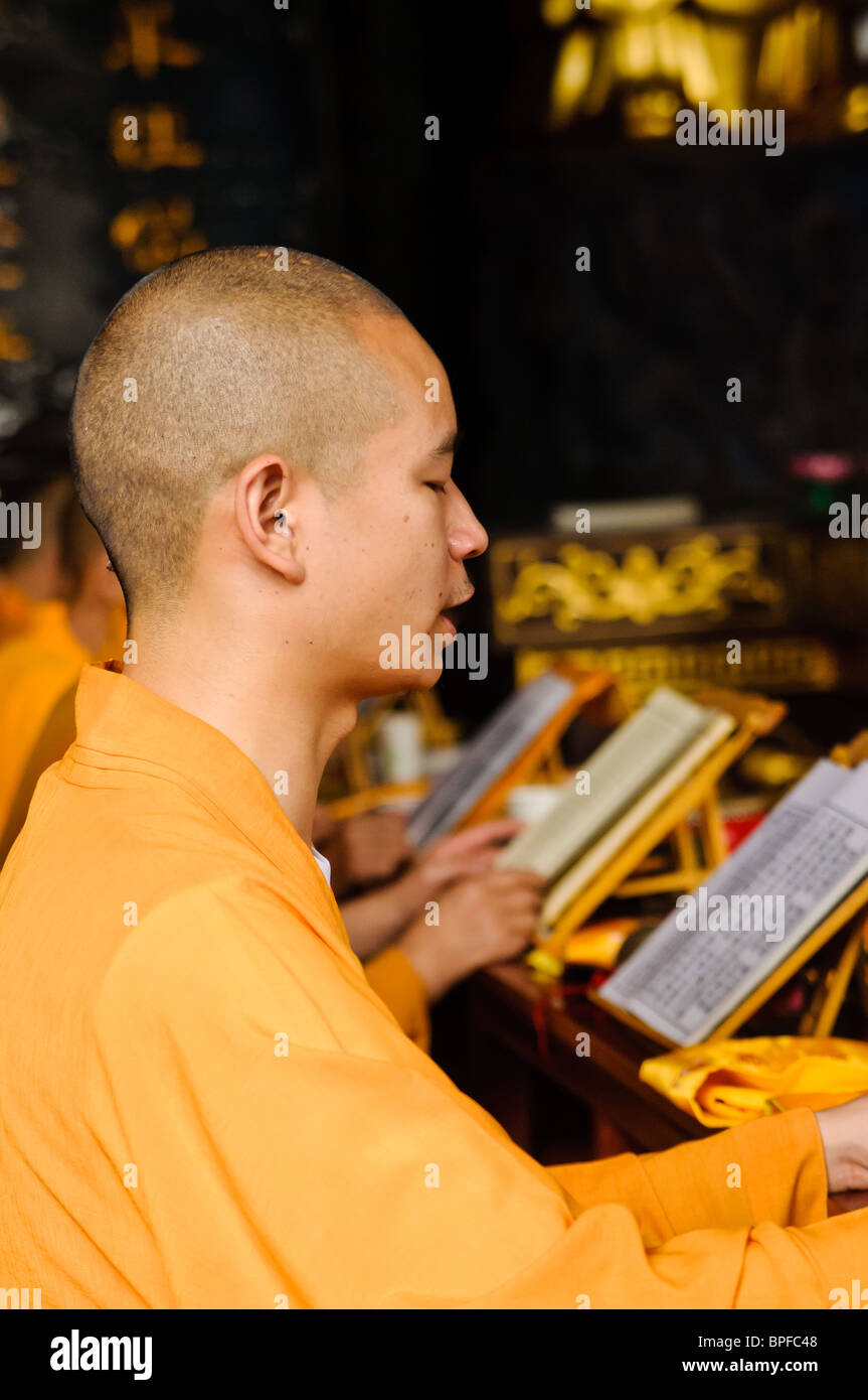 Monk studying in Xian, China Stock Photo - Alamy