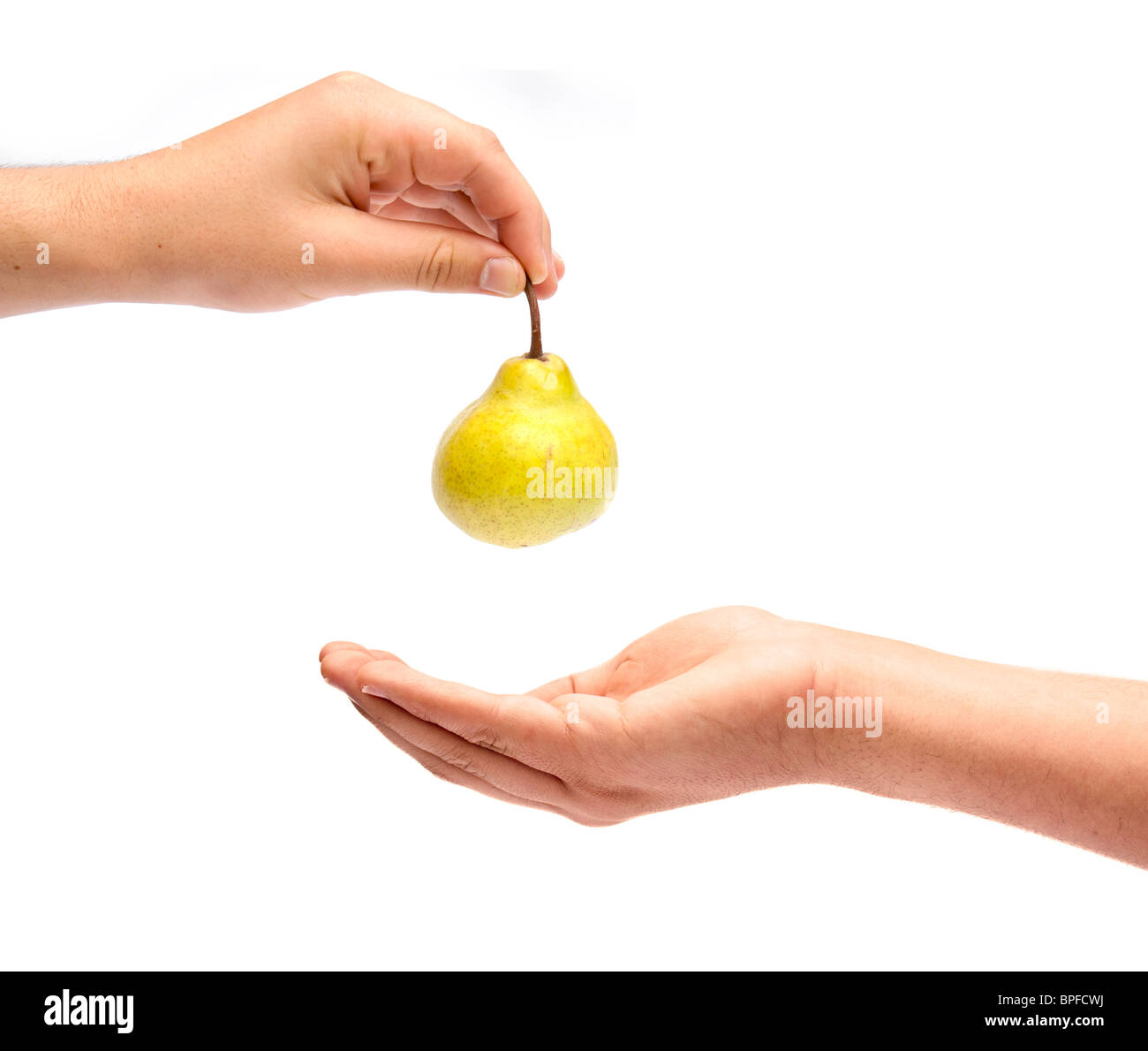 Hand Giving a Pear Stock Photo - Alamy
