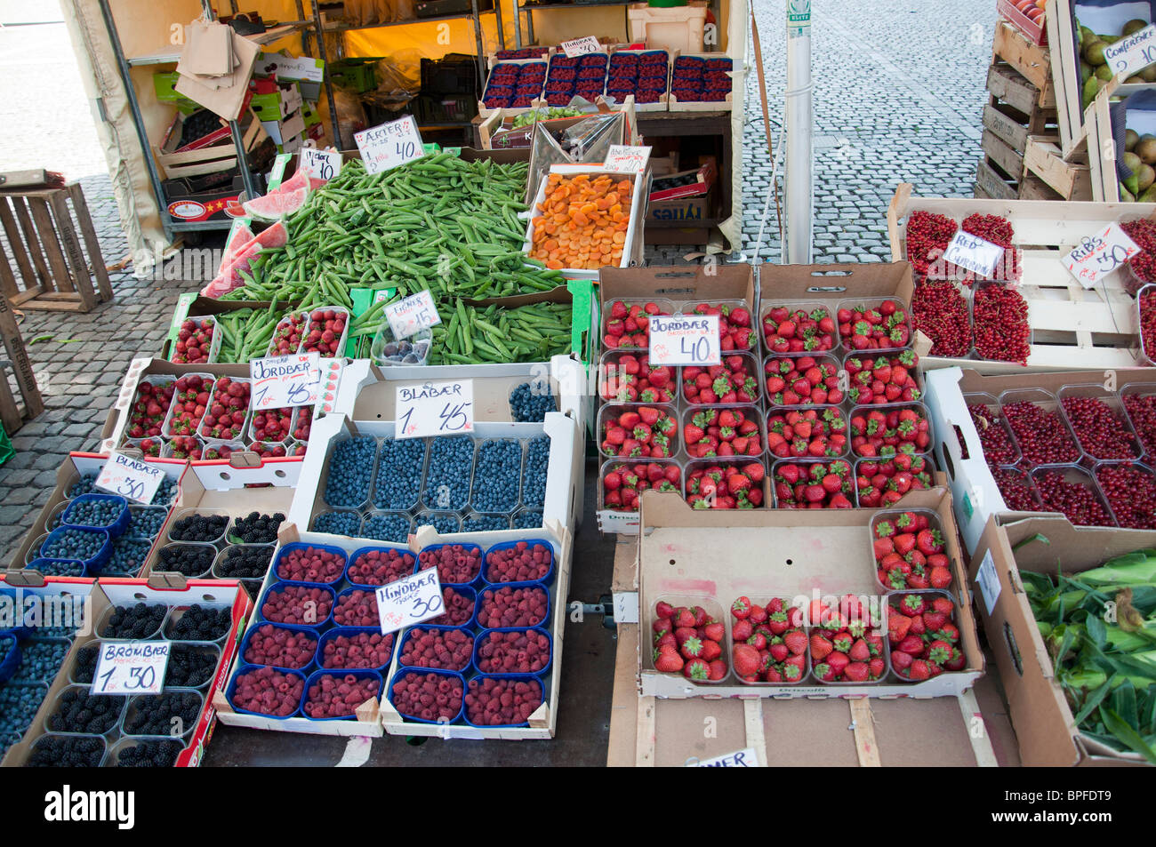 A stall selling fruit and vegetables at a market square in Copenhagen ...