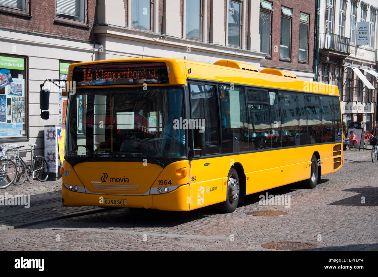 A local yellow travel bus in Copenhagen, Denmark Stock Photo - Alamy