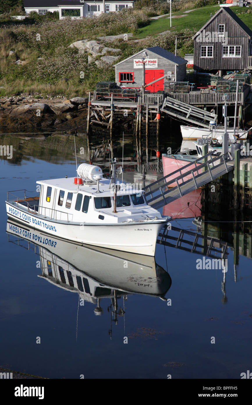 ship moored in the port of Peggy's Cove, a famous Fishing Village in ...