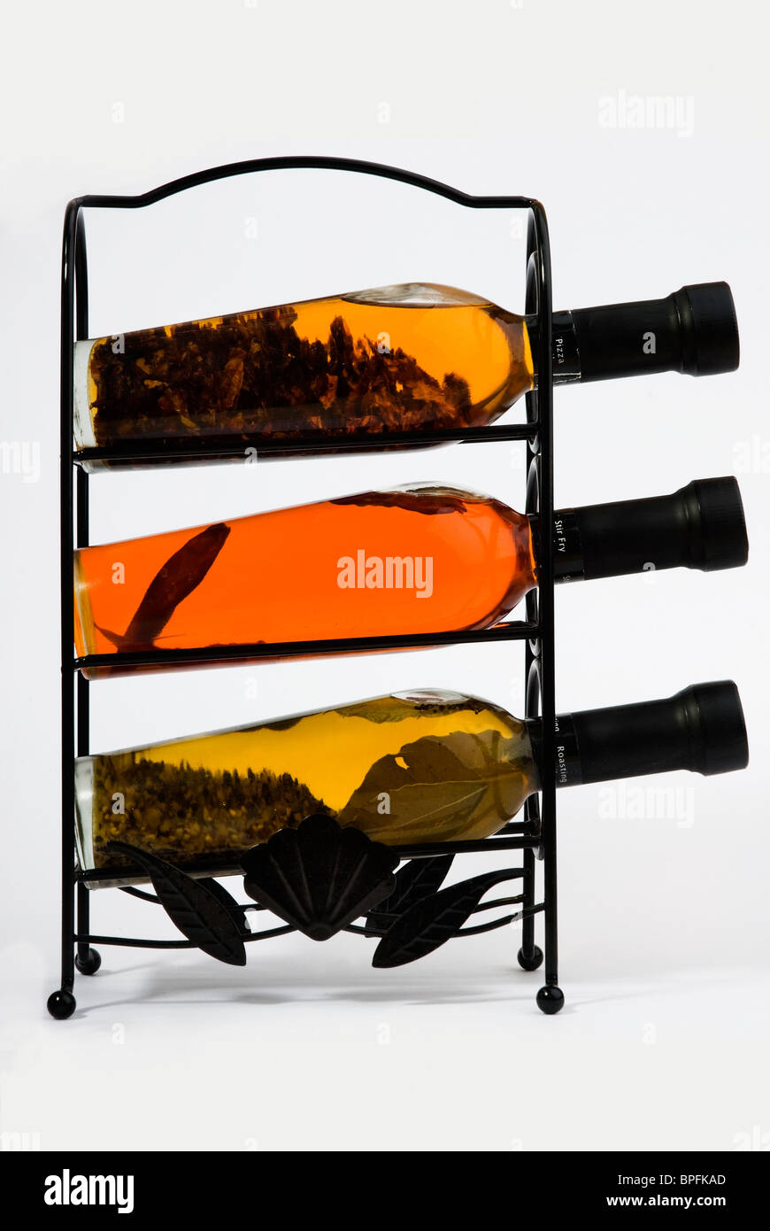 Rack of spiced cooking oils Stock Photo - Alamy