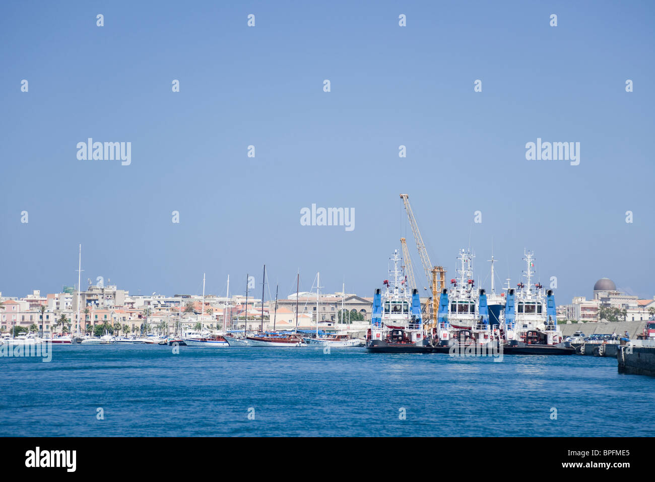 The port of Milazzo with large tugs and yachts Stock Photo - Alamy